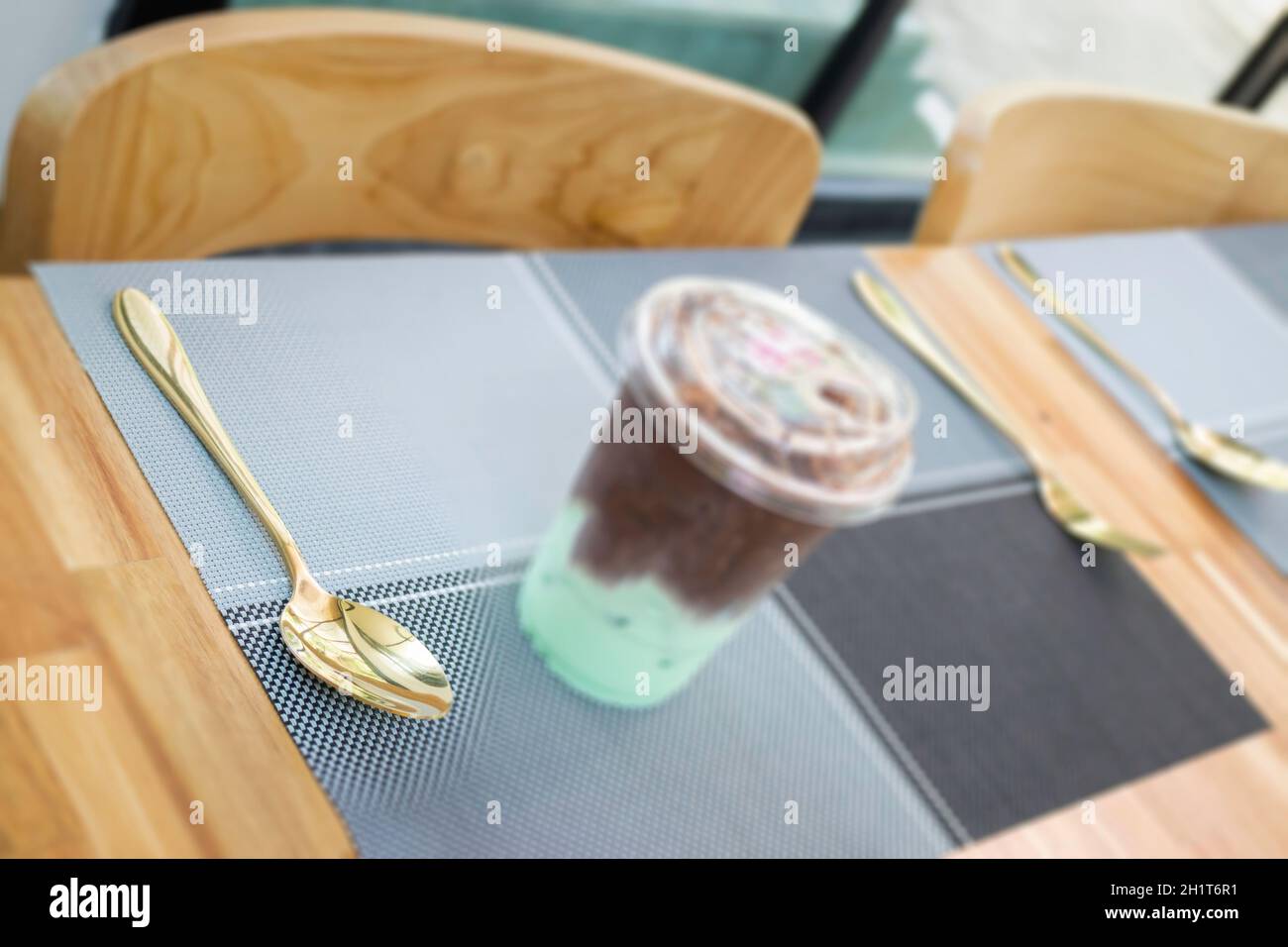 Iced coffee on dining table background, stock photo Stock Photo - Alamy