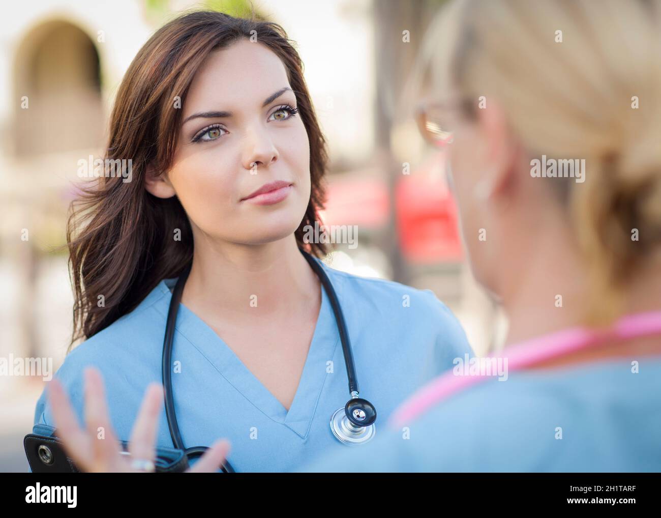Smiling doctors outside hi-res stock photography and images - Alamy