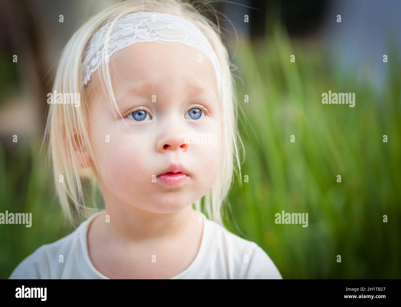 Cute Little Girl With Blue Eyes