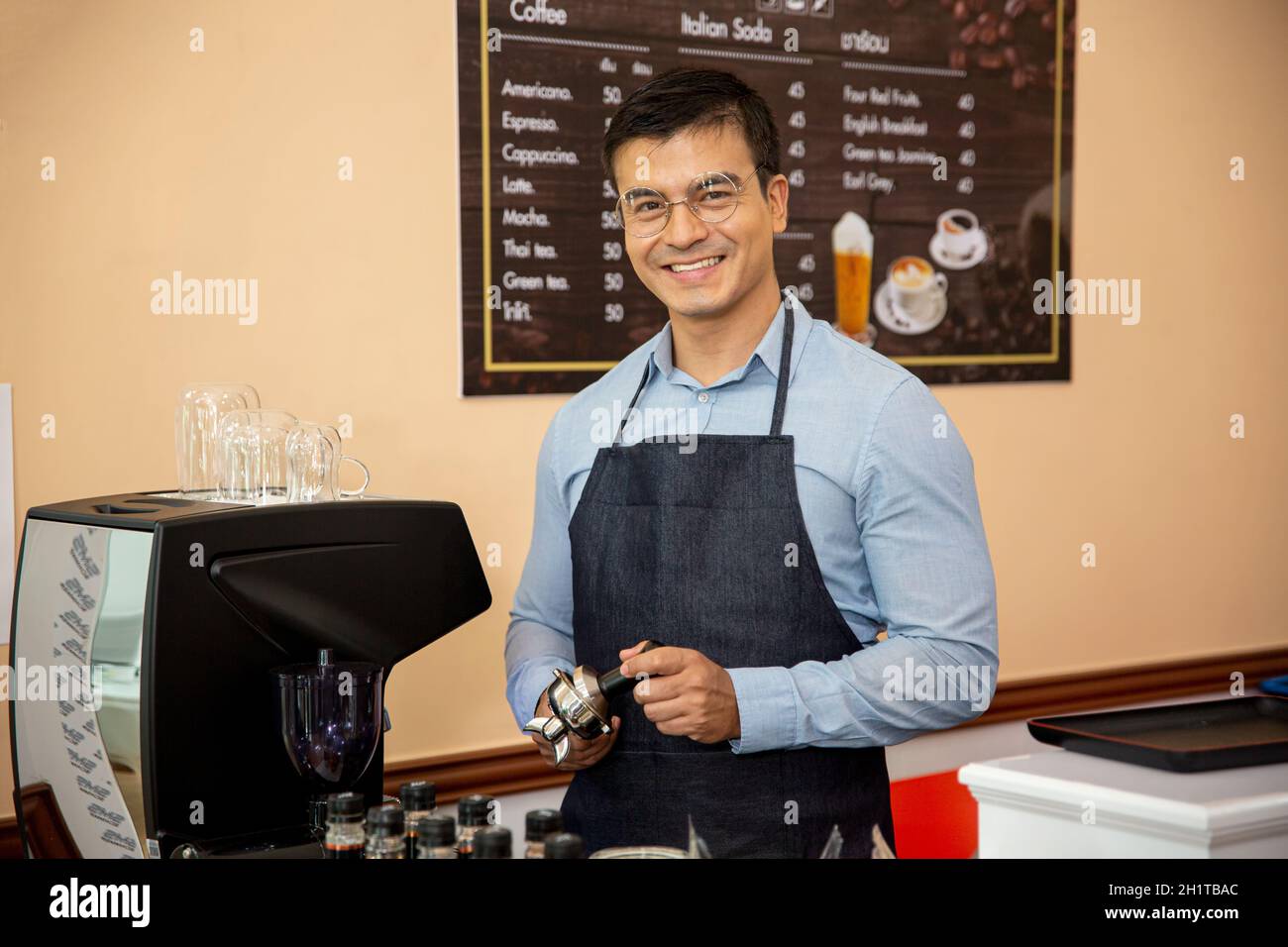 In charming coffee shop handsome hi-res stock photography and images ...