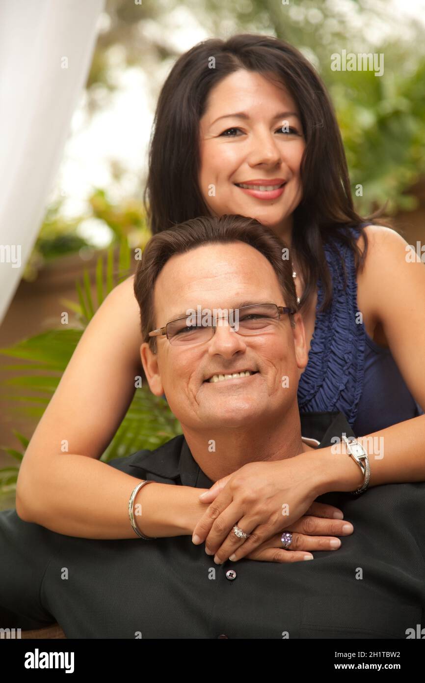 Happy Attractive Hispanic and Caucasian Couple Portrait Stock Photo - Alamy