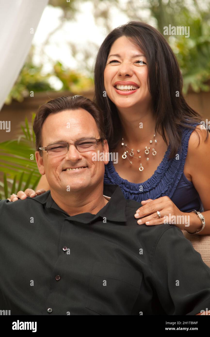 Happy Attractive Hispanic and Caucasian Couple Portrait Stock Photo - Alamy