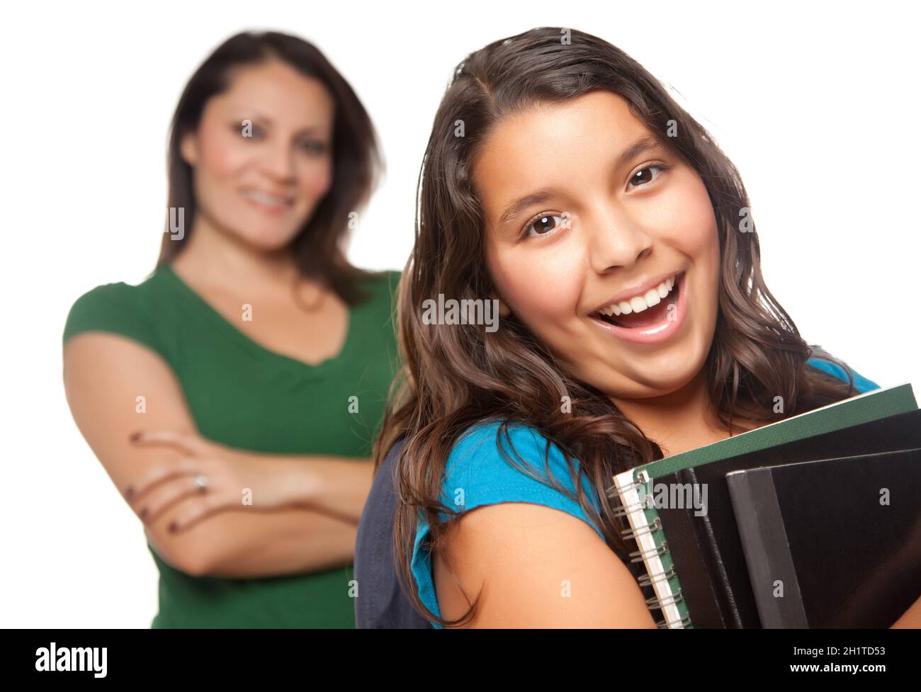 Proud Hispanic Mother and Daughter Ready for School Isolated on a White ...