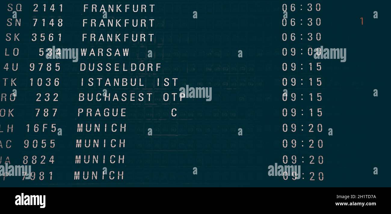 Detail view of a typical airport information board Stock Photo - Alamy