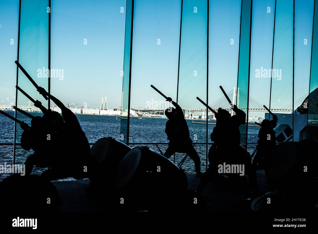 Silhouette of people who hit the big drum. Shooting Location: Yokohama ...