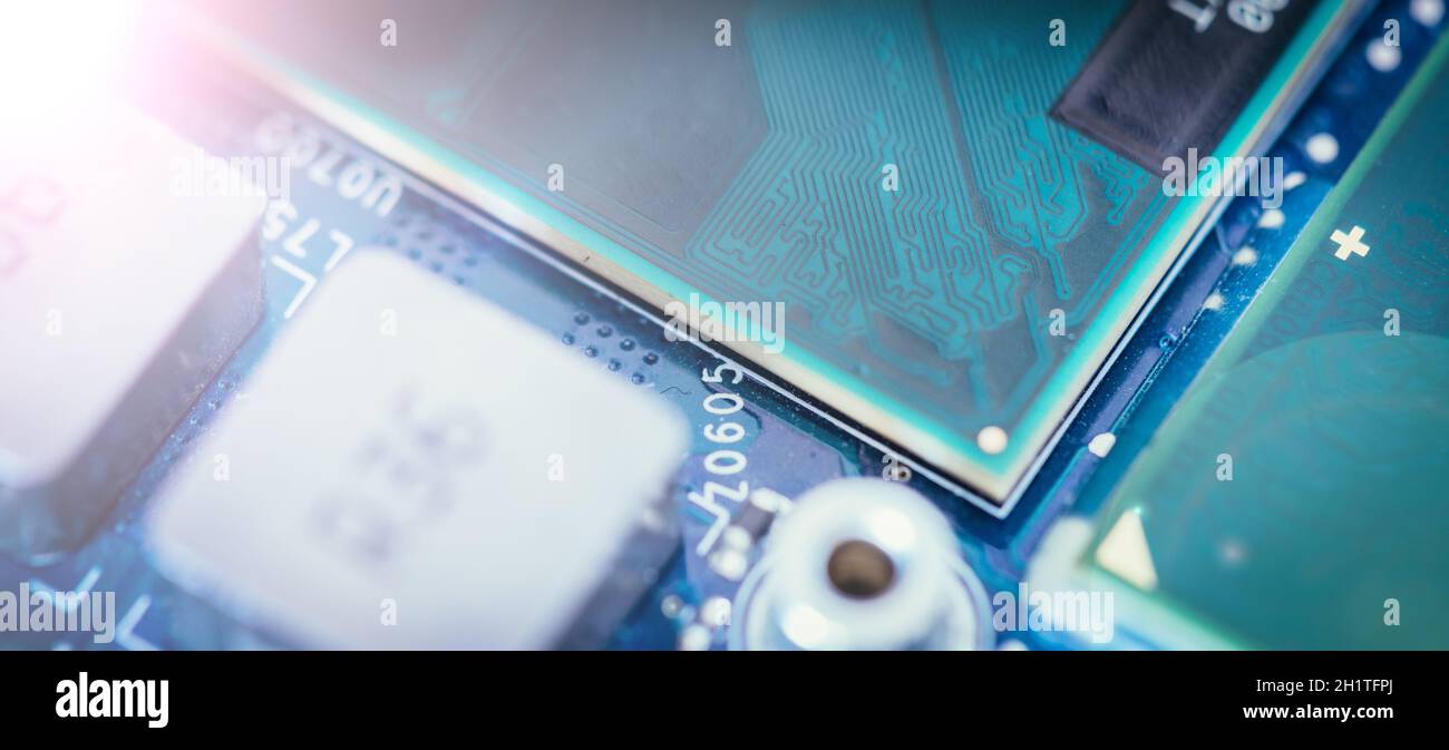 Computer chip on a circuit board, close up with light effect. Computer ...