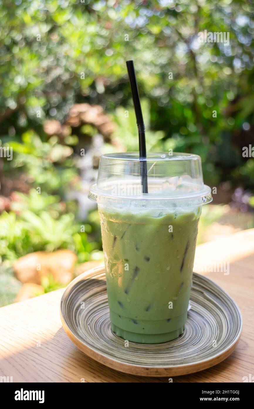 Iced green tea drink in disposable take away cup, stock photo Stock ...