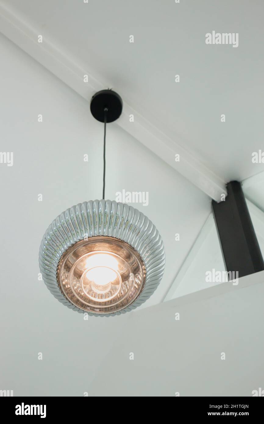 Light lamp hanging from the ceiling Stock Photo - Alamy