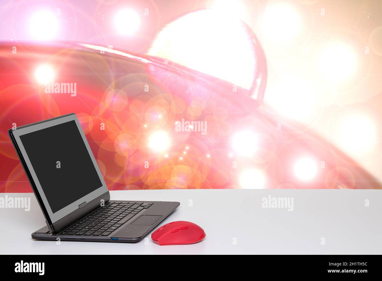 Table top on computer background. Modern portable Laptop with blank ...