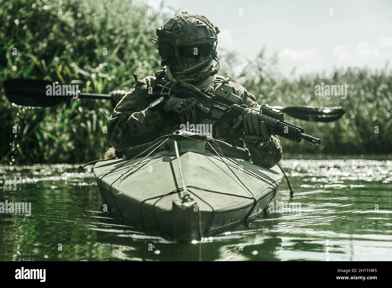 Special forces operators in the military kayak Stock Photo - Alamy