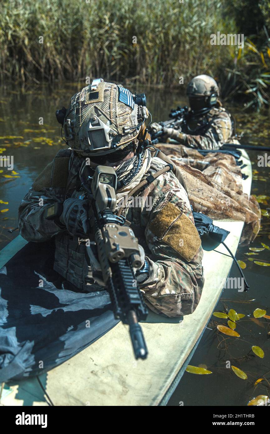 Special forces operators in the military kayak Stock Photo - Alamy