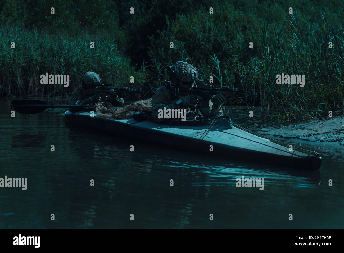 Special forces operators in the military kayak Stock Photo - Alamy