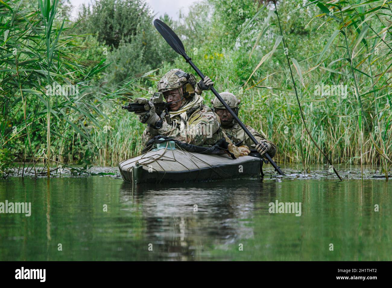 Special forces operators in the military kayak Stock Photo - Alamy