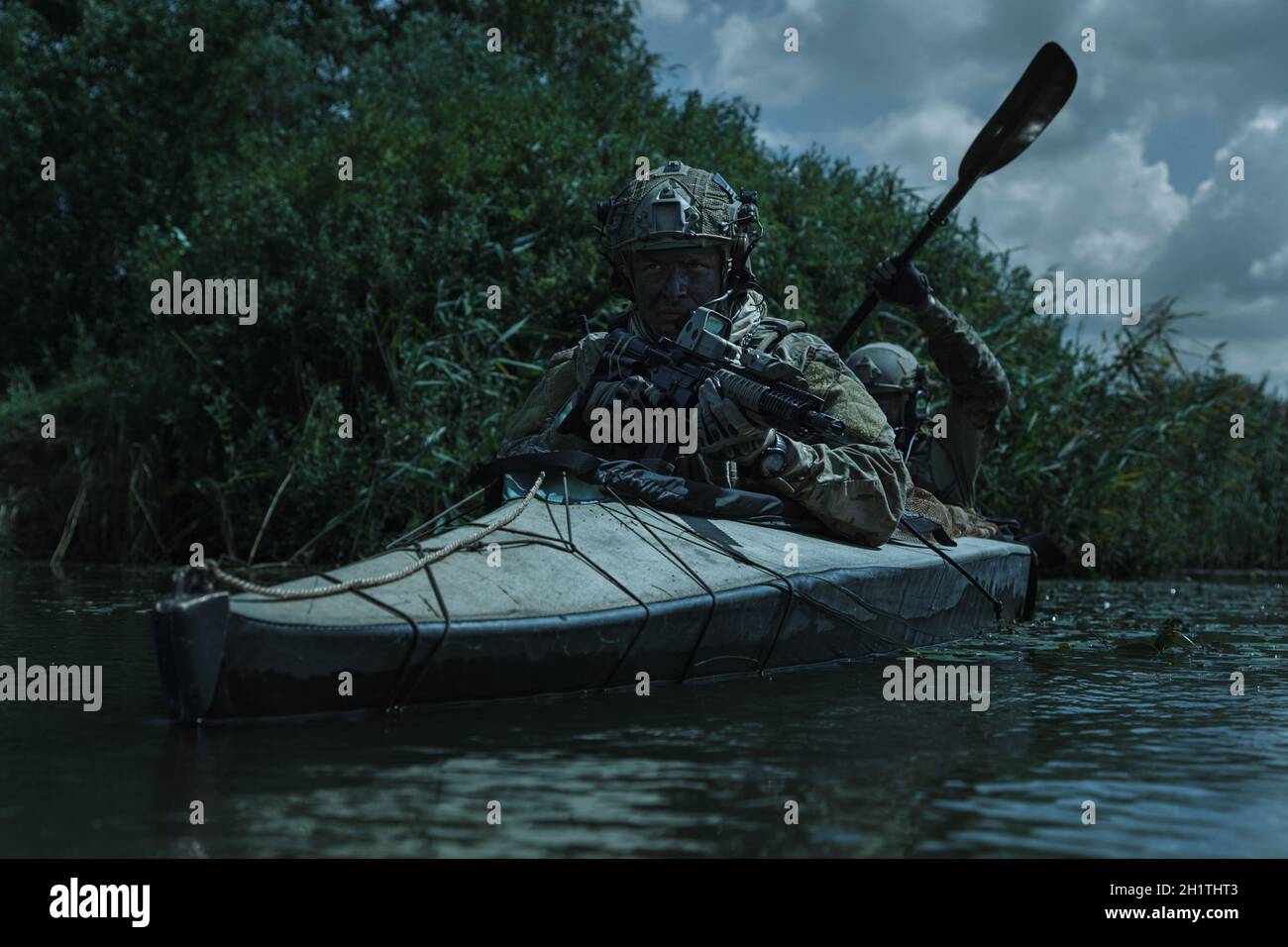 Special forces operators in the military kayak Stock Photo - Alamy