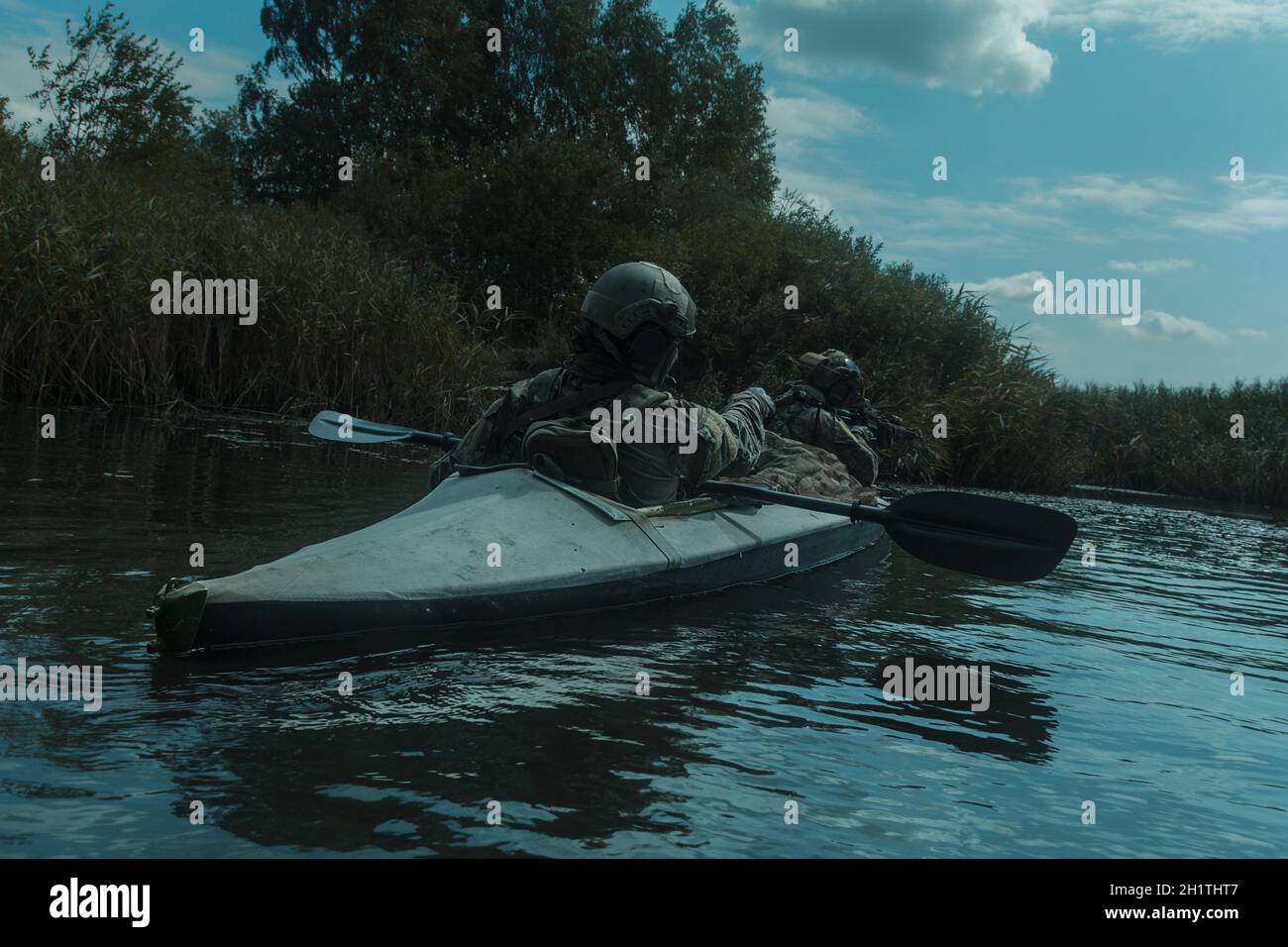Special forces operators in the military kayak Stock Photo - Alamy