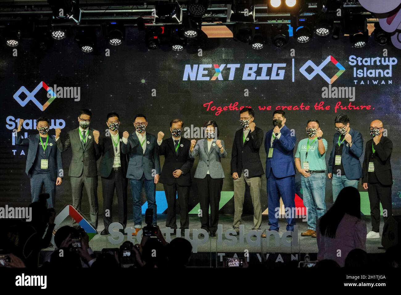 Taiwanese President Tsai Ing-wen (C) poses for a picture with the guests during the Startups ...