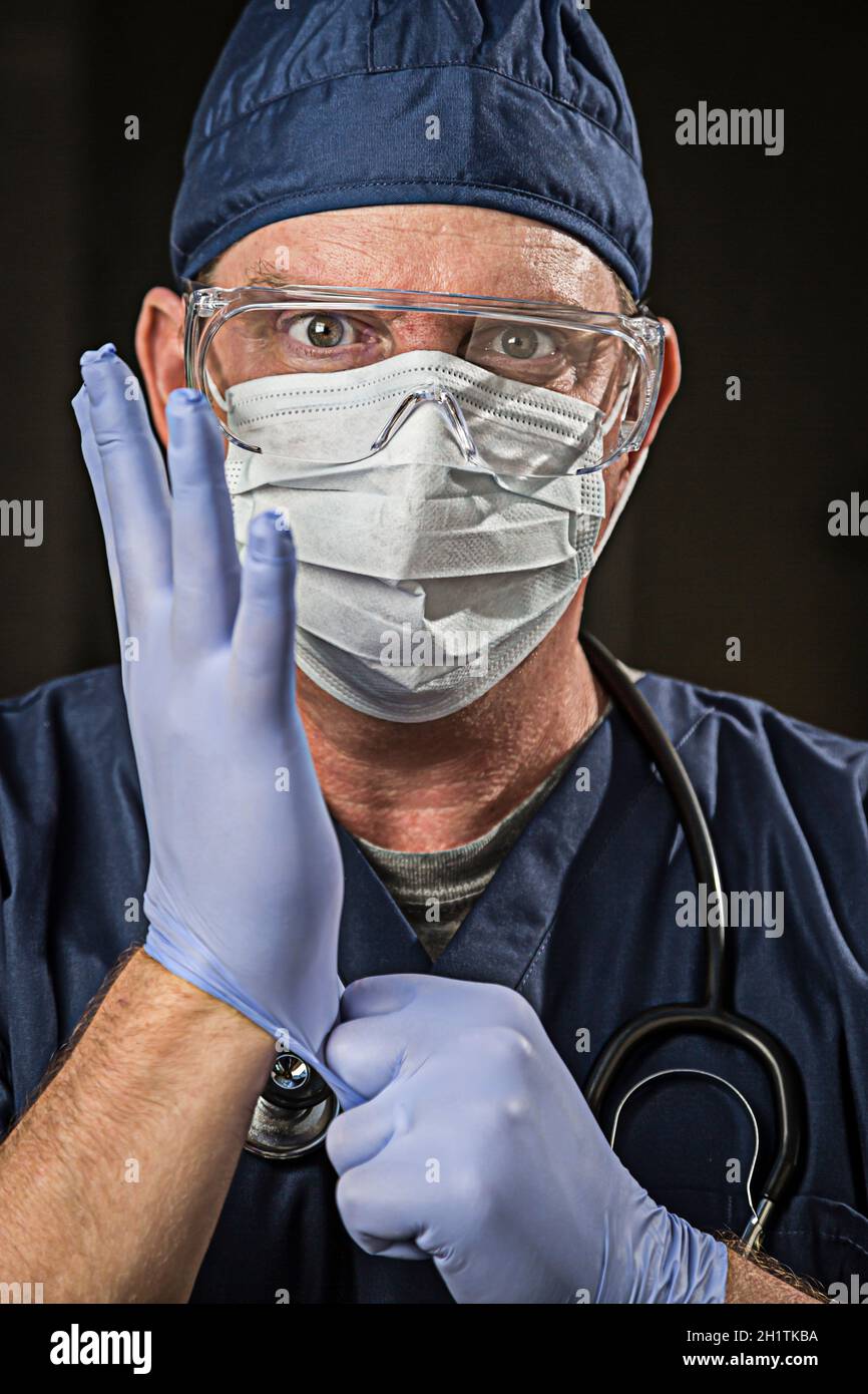 Determined Looking Male Doctor or Nurse with Protective Wear and ...