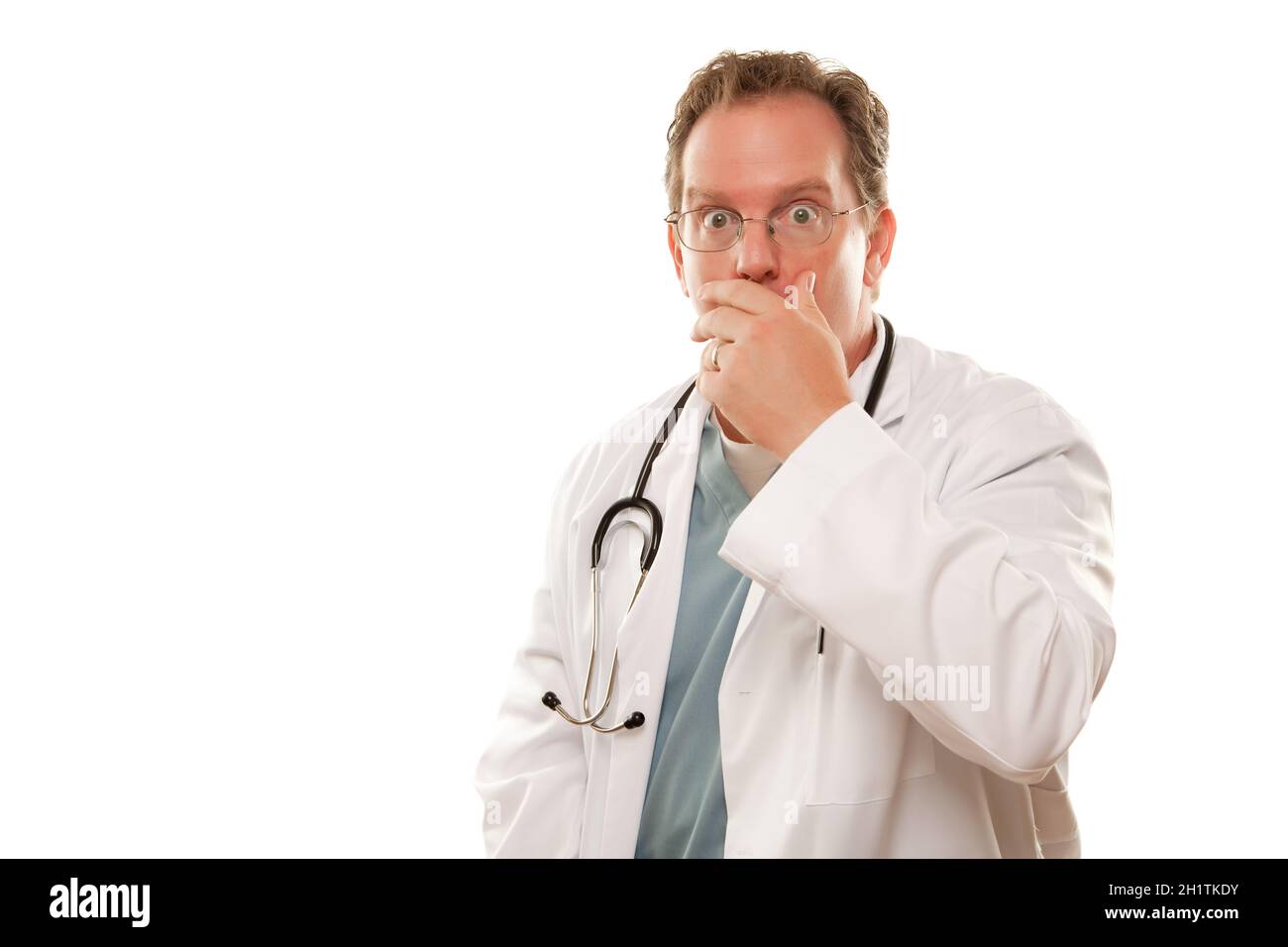 Male Doctor with Concerned Look and Hand Over Mouth Isolated on a White ...