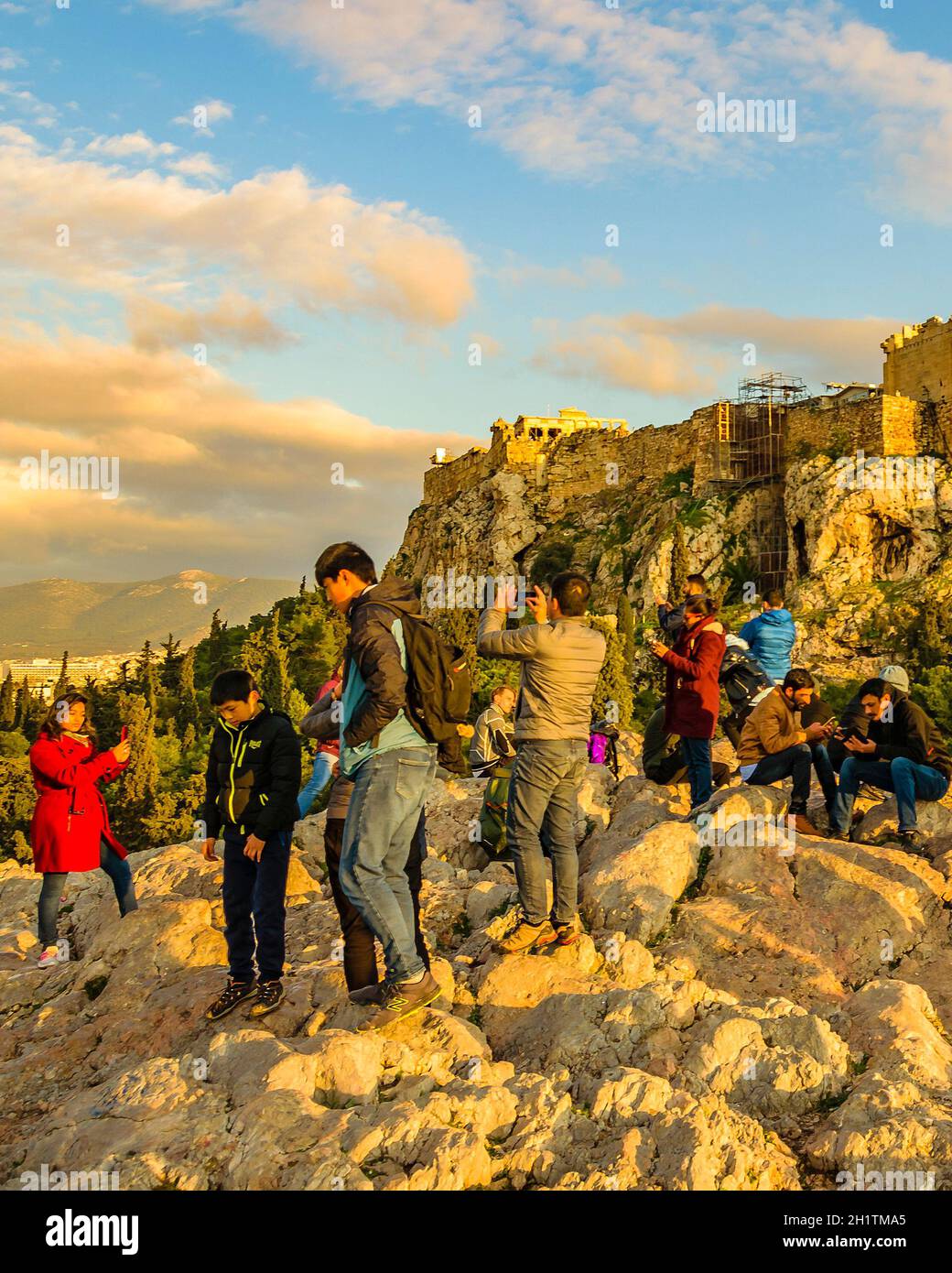 ATHENS, GREECE, DECEMBER - 2019 - Crowd at top of philopappos hill, a ...