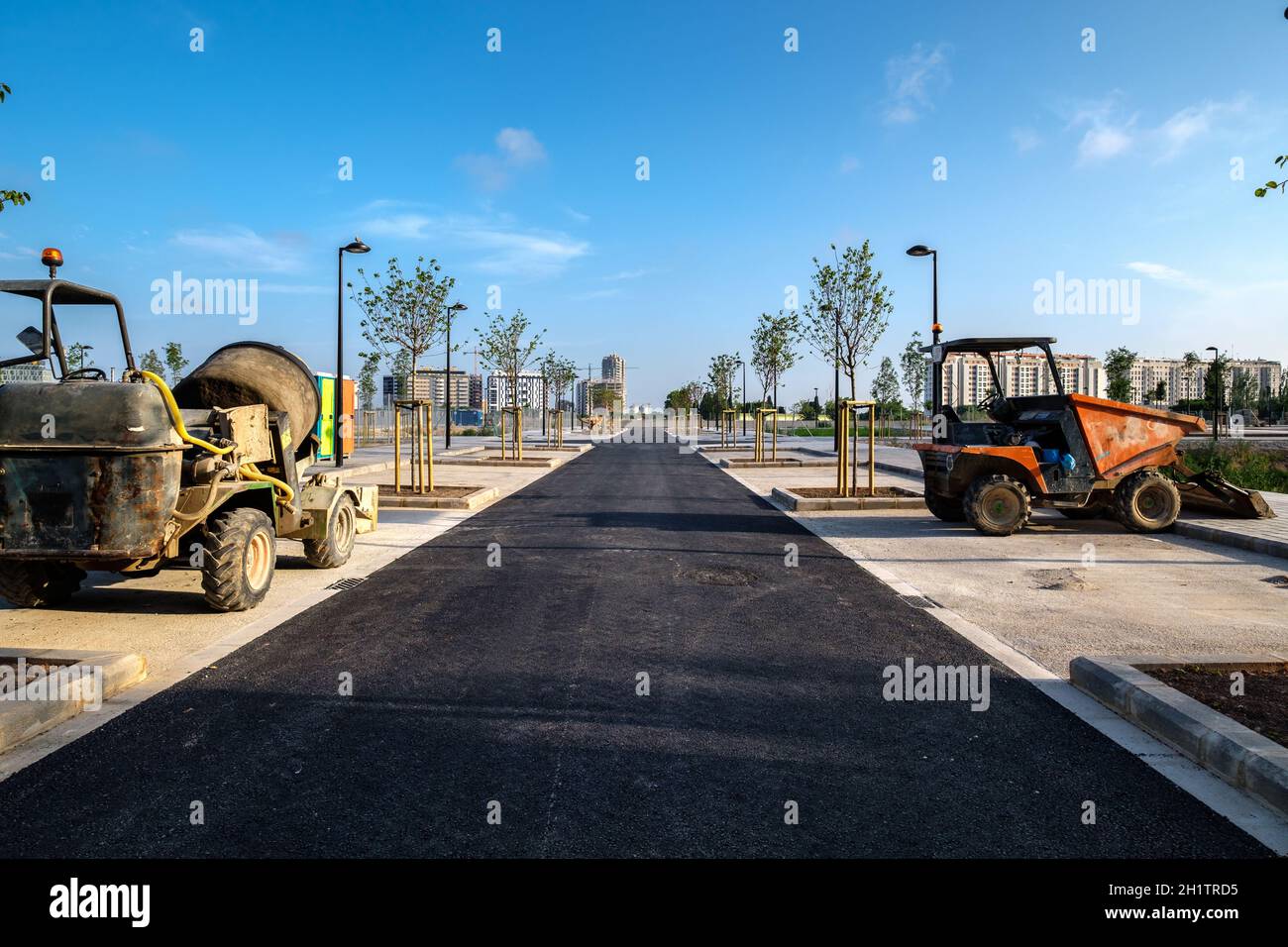 paving works on roads with new street machinery in a residential ...