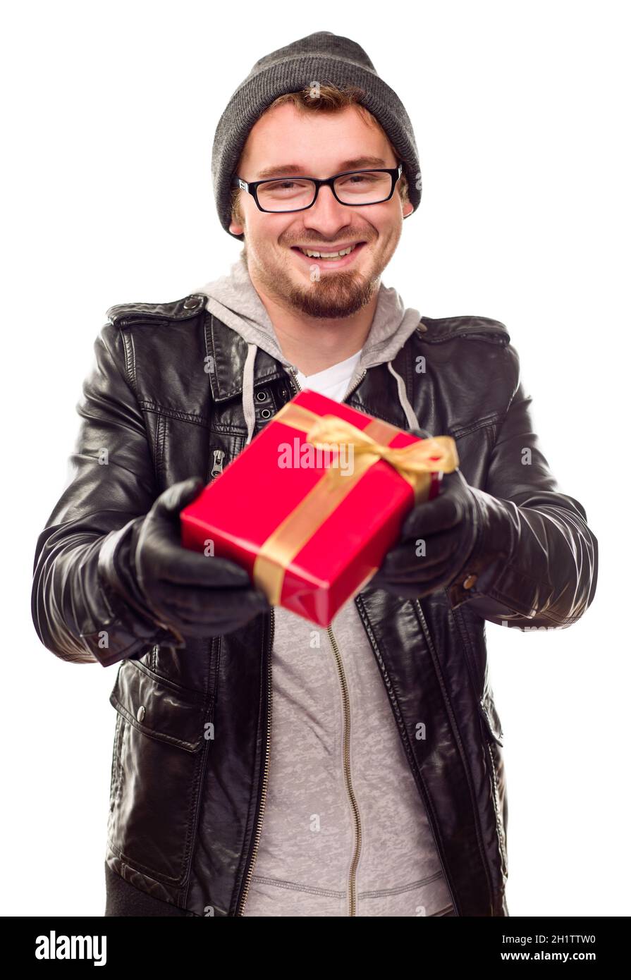 Warmly Dressed Handsome Young Man Handing Wrapped Gift Out Isolated on ...