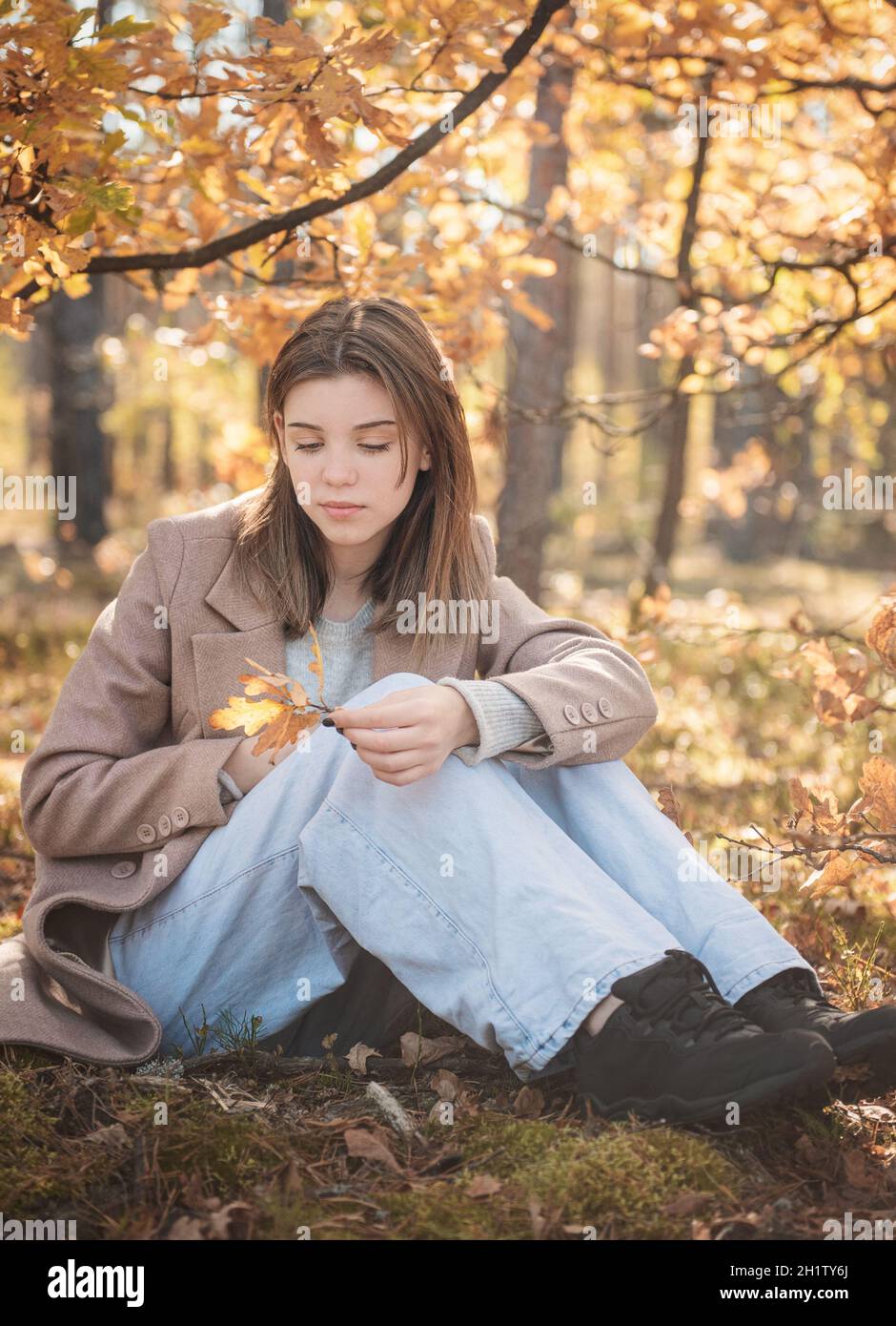 Portrait of a thoughtful and sad girl. Autumn colors . Lifestyle ...
