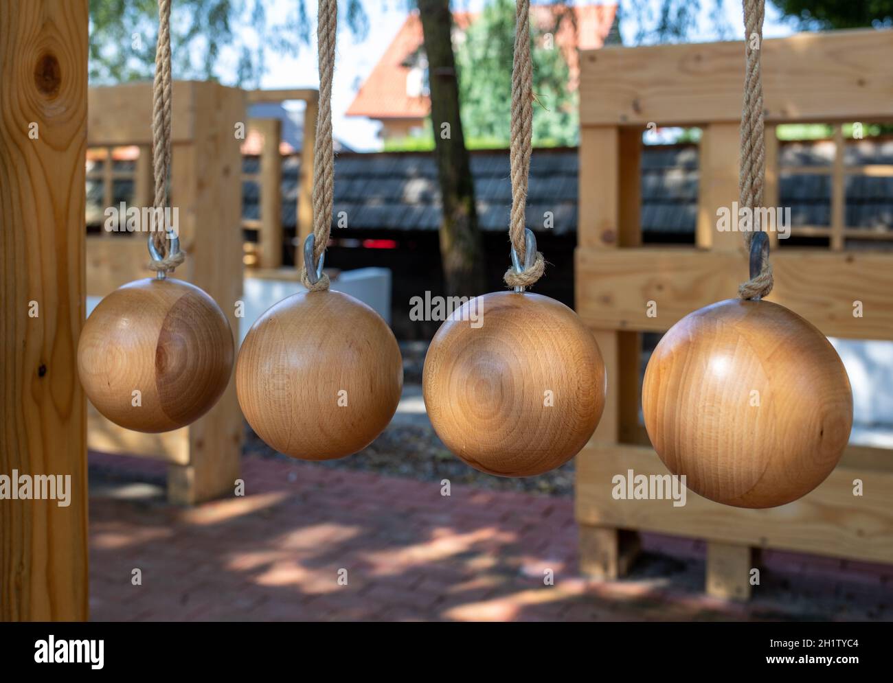 Wygiezlow; Poland - August 14; 2020: wooden balls hanging on ropes in ...