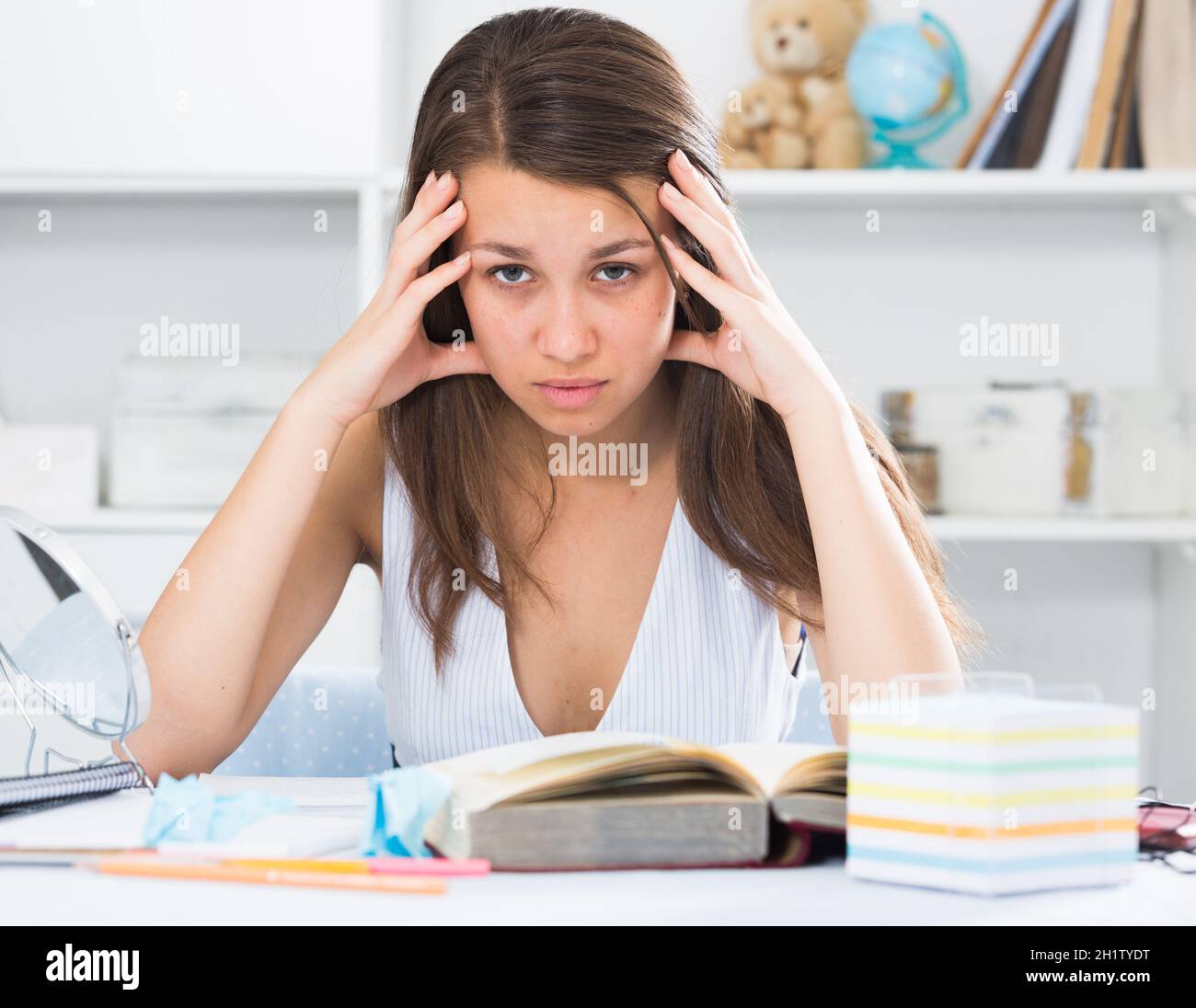 Female student is solving an equation Stock Photo - Alamy