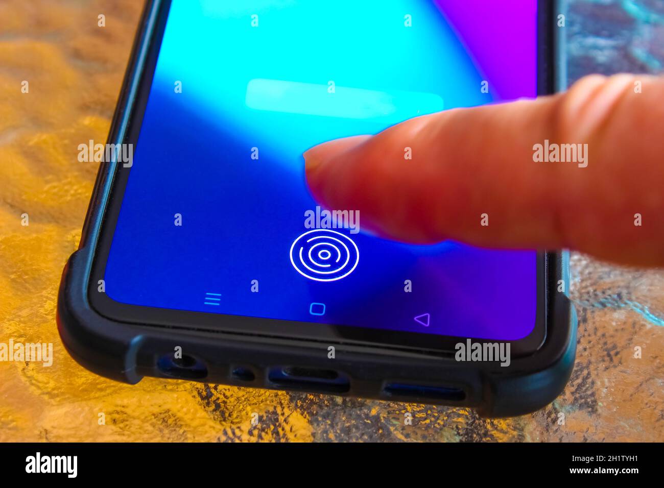 Hand holding modern mobile phone showing application with process of ...