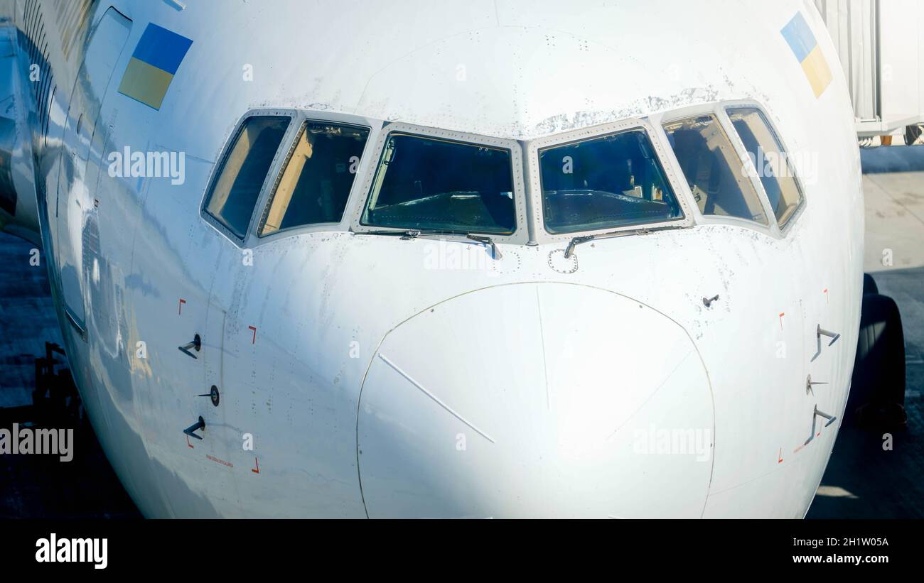 Nose of the airplane with pilot cockpit and wide windshield Stock Photo ...