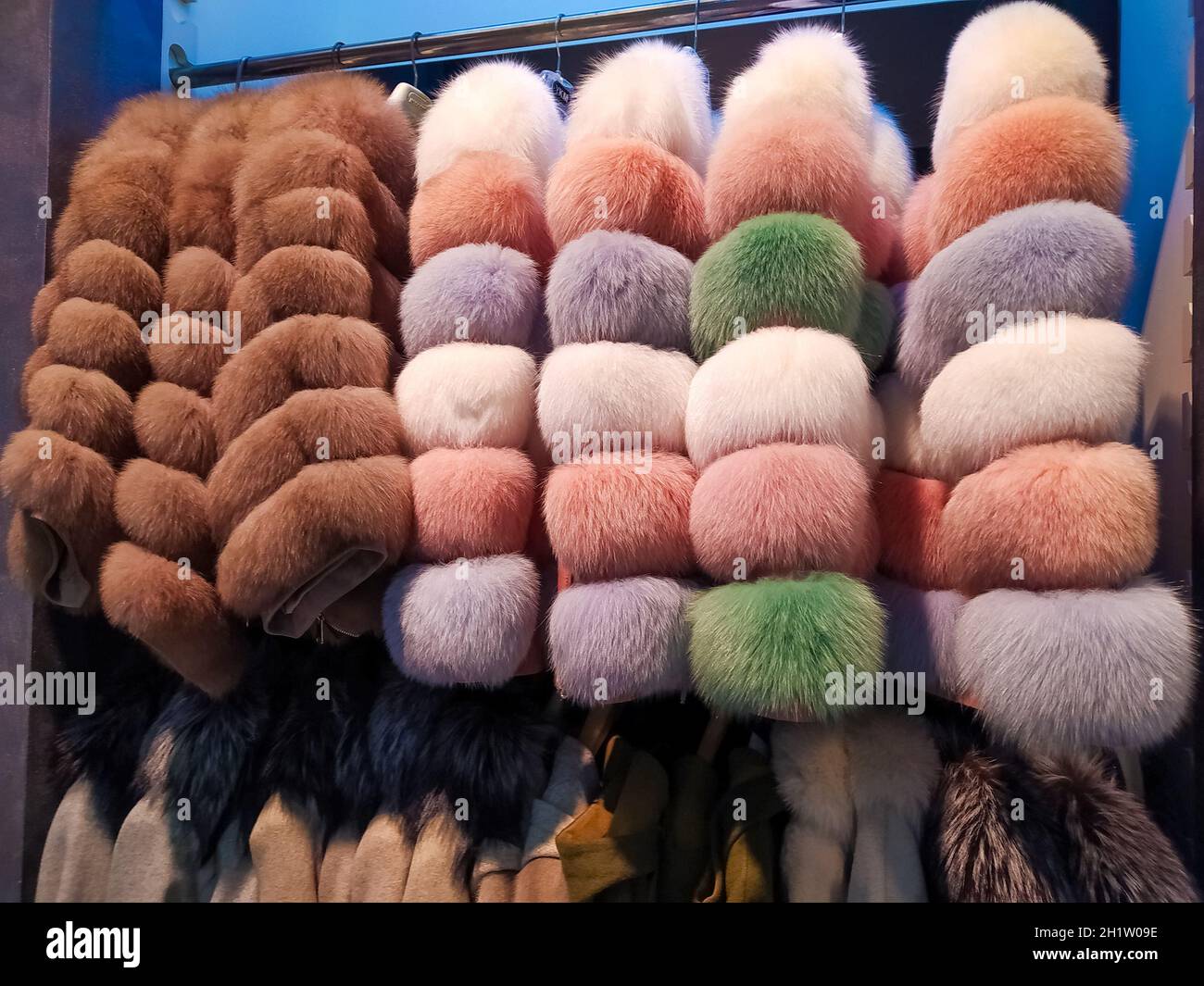 The womans many color winter fur clothes in fashion shop at Turkey ...