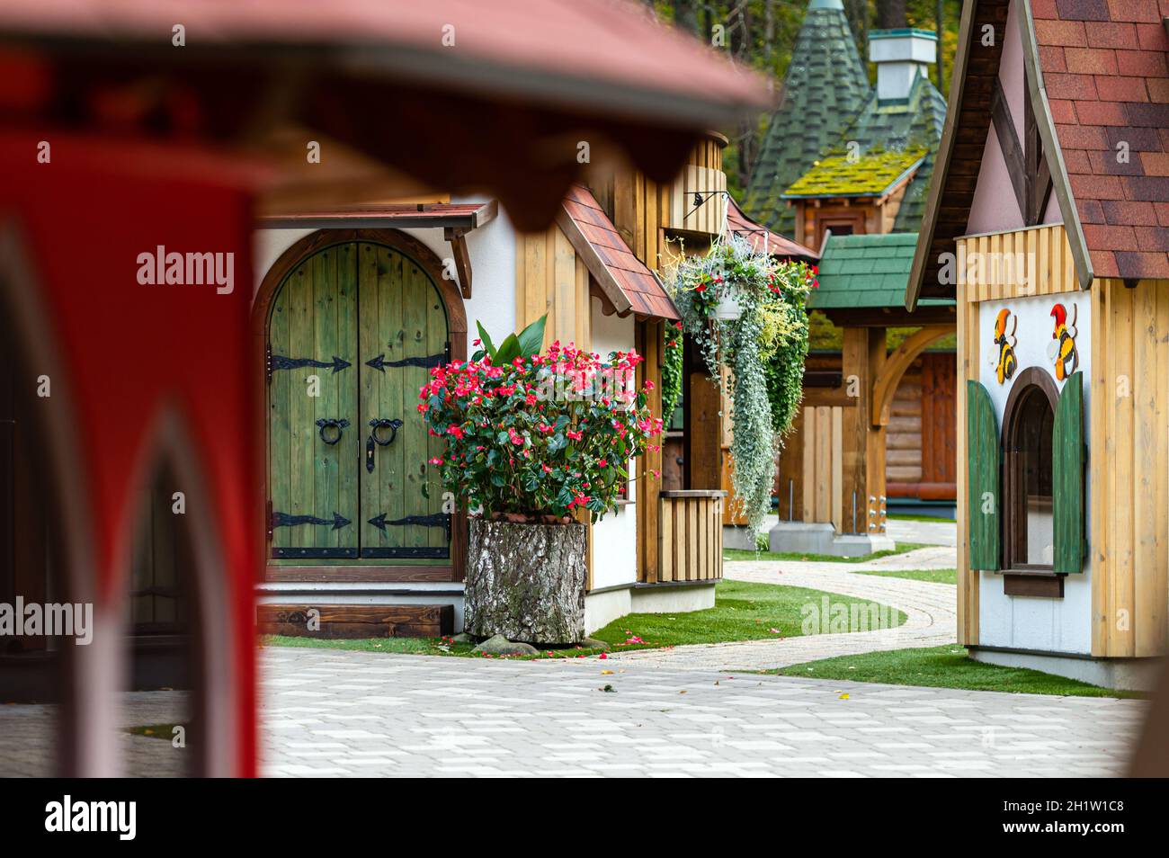 gnome village in attraction park, tiny dwarf houses with colorful ...