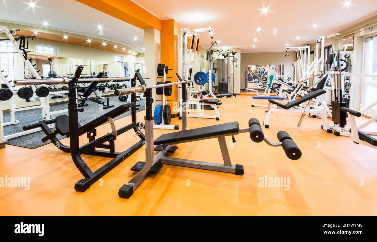 Interior view of a gym with equipment Stock Photo - Alamy