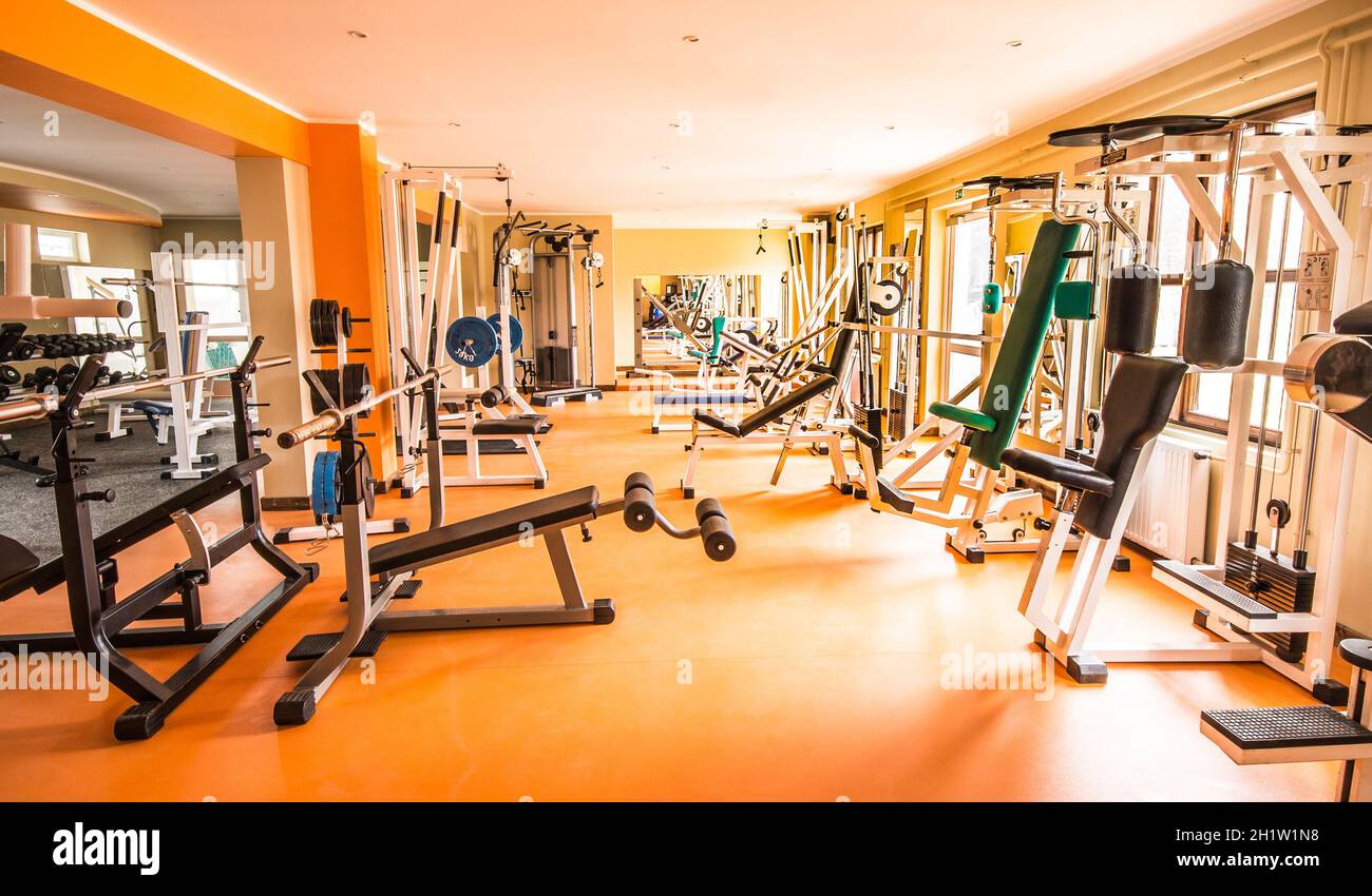 Interior view of a gym with equipment Stock Photo - Alamy