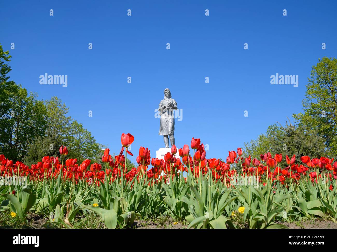 Statue of a collective farmer on a pedestal. The legacy of the Soviet ...