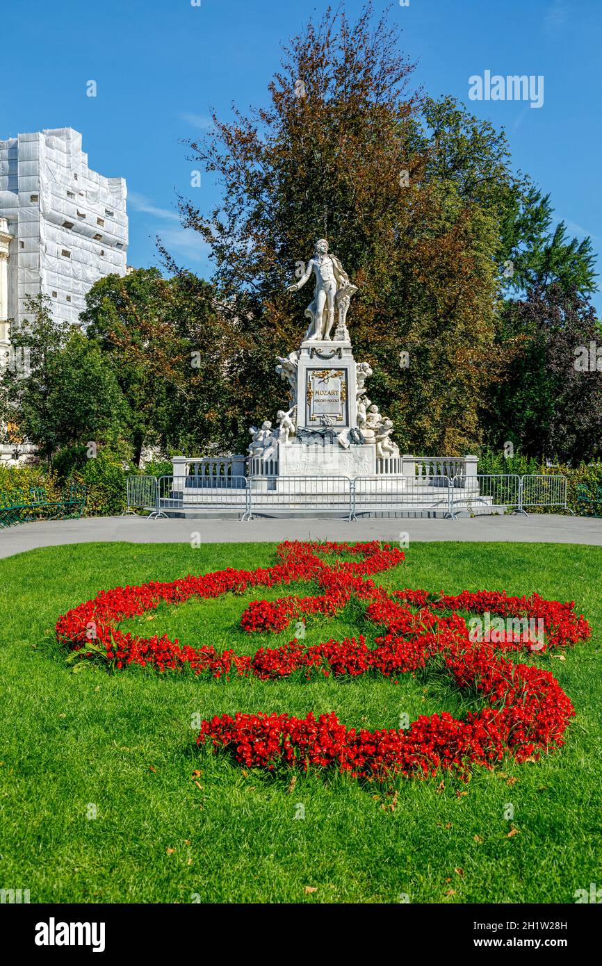 Mozart Statue with flower decoration in the form of a musical treble ...