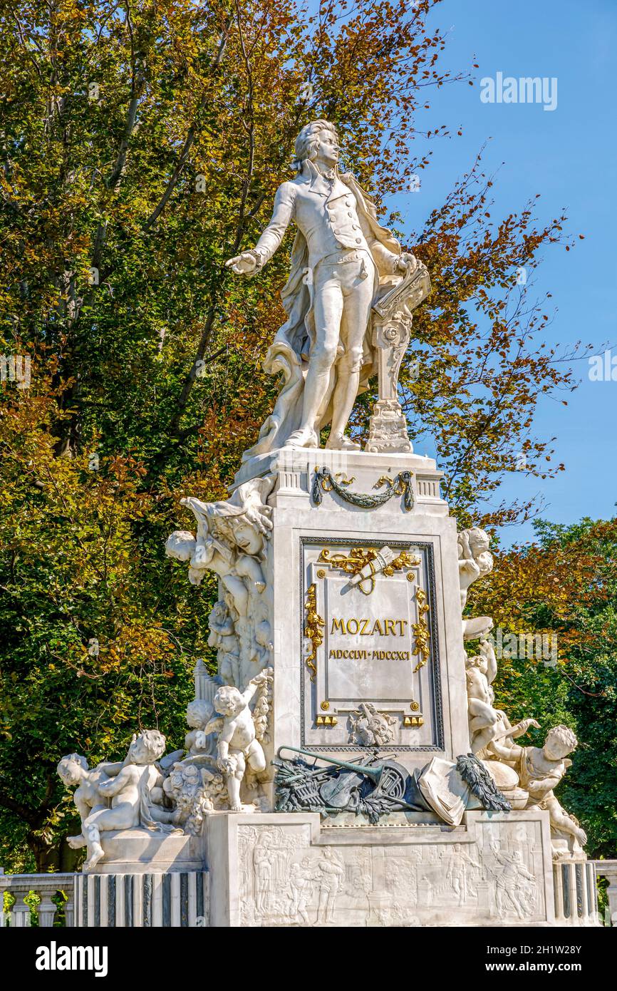 Mozart Statue with flower decoration in the form of a musical treble ...