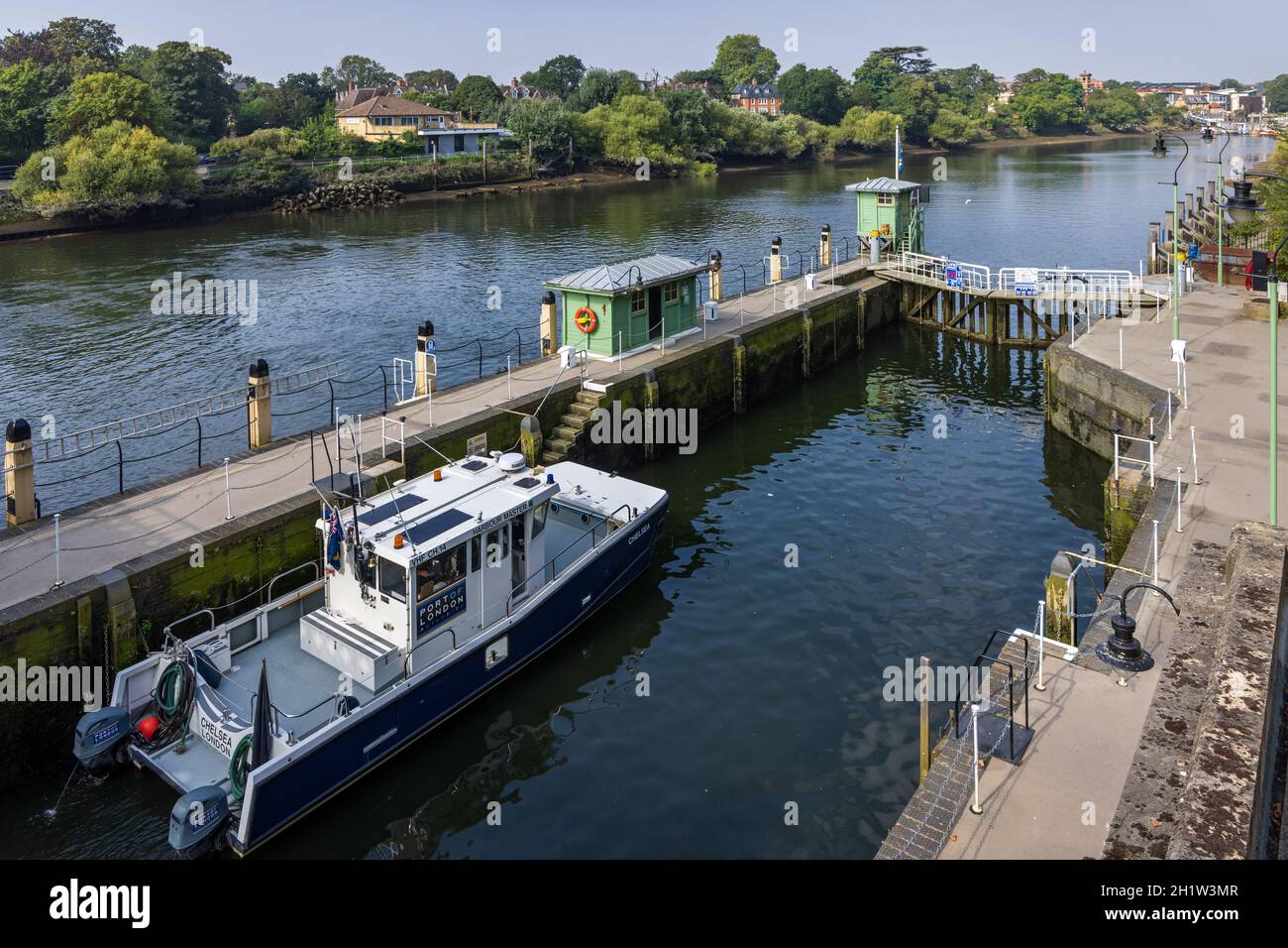 Richmond Lock and Weir on the River Thames at Richmond is a half tide ...