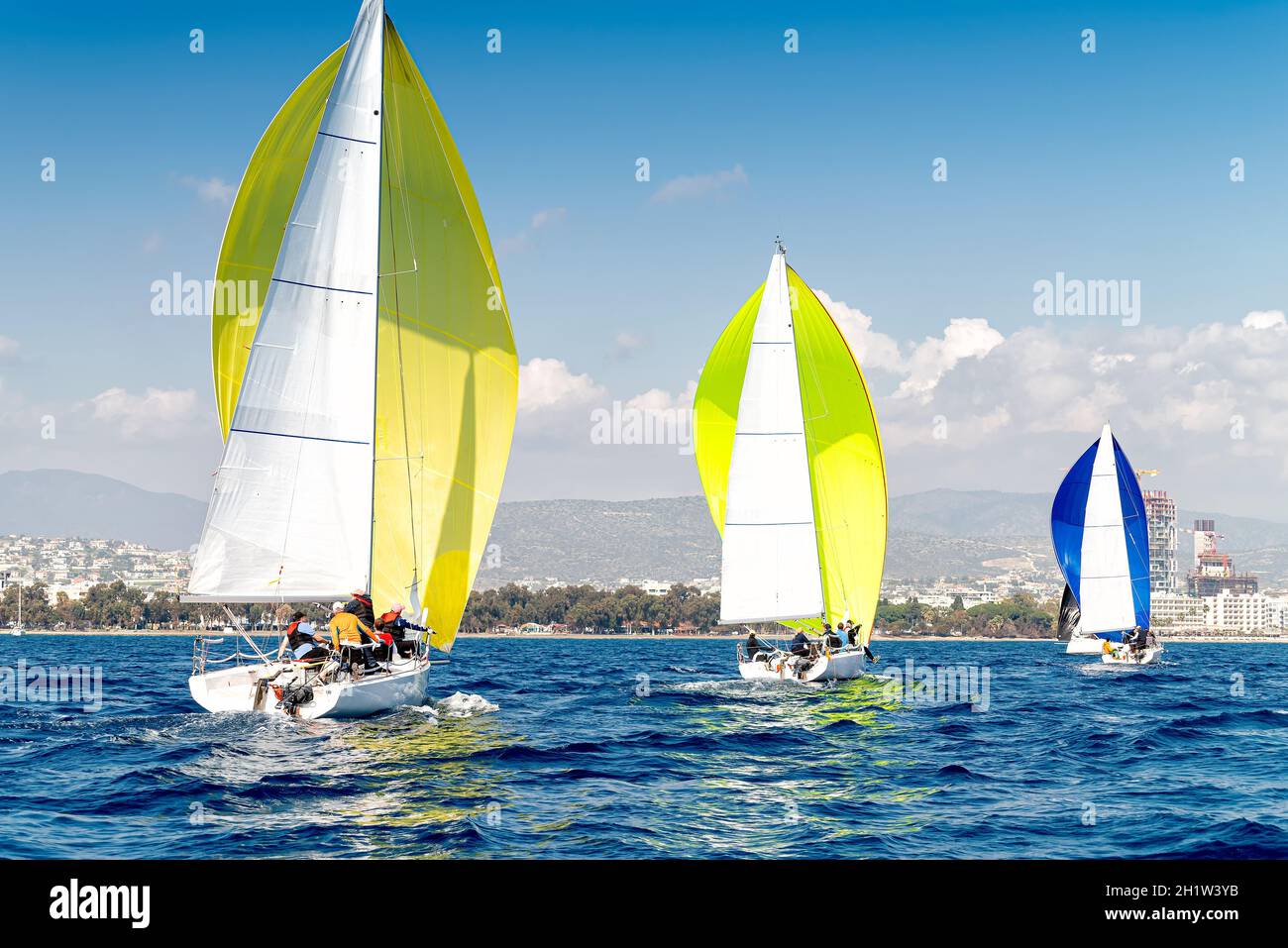 Three sport sailing boats during the regatta Stock Photo - Alamy