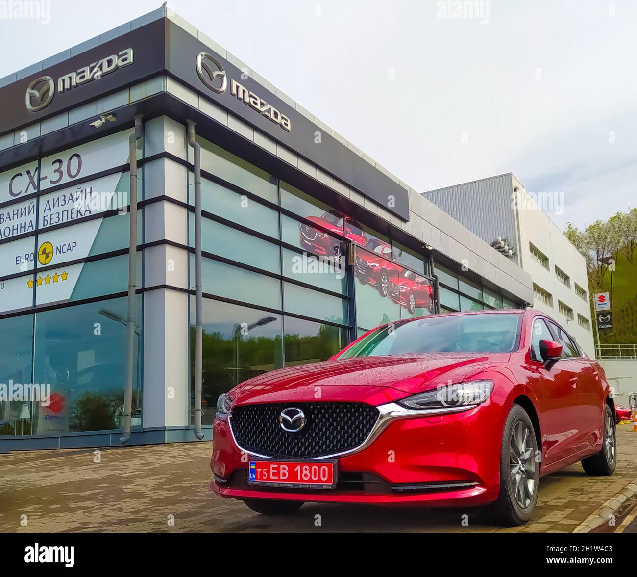 Kyiv, Ukraine - August 15, 2020: retail of Mazda logo on store front ...