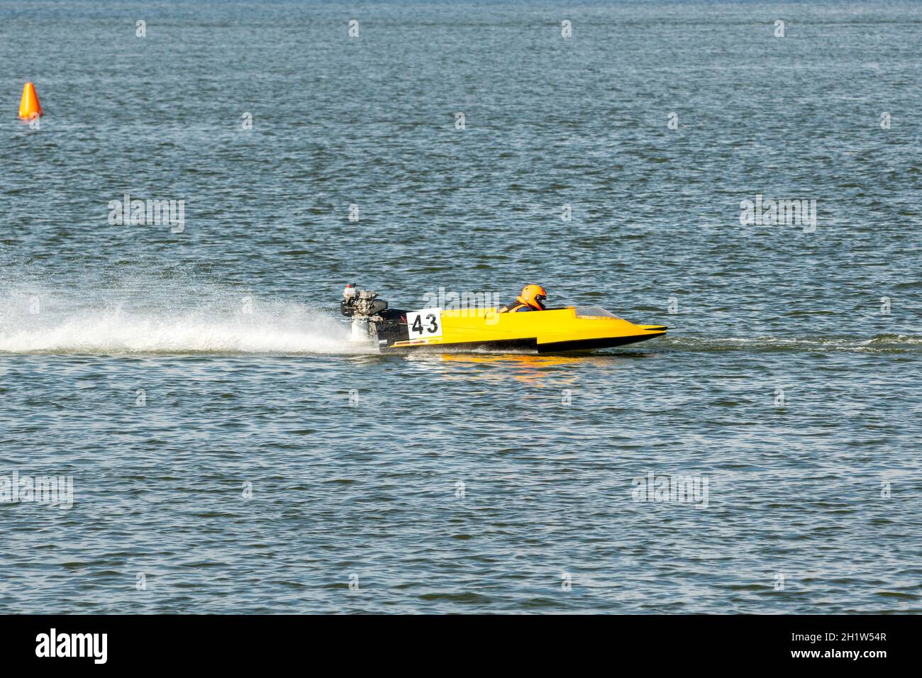 Yellow powerboat go fast along the lake in Powerboat competition Stock ...