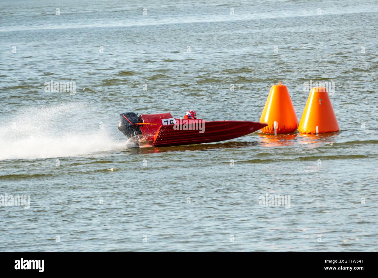 Red powerboat go fast along the lake in Powerboat competition Stock ...