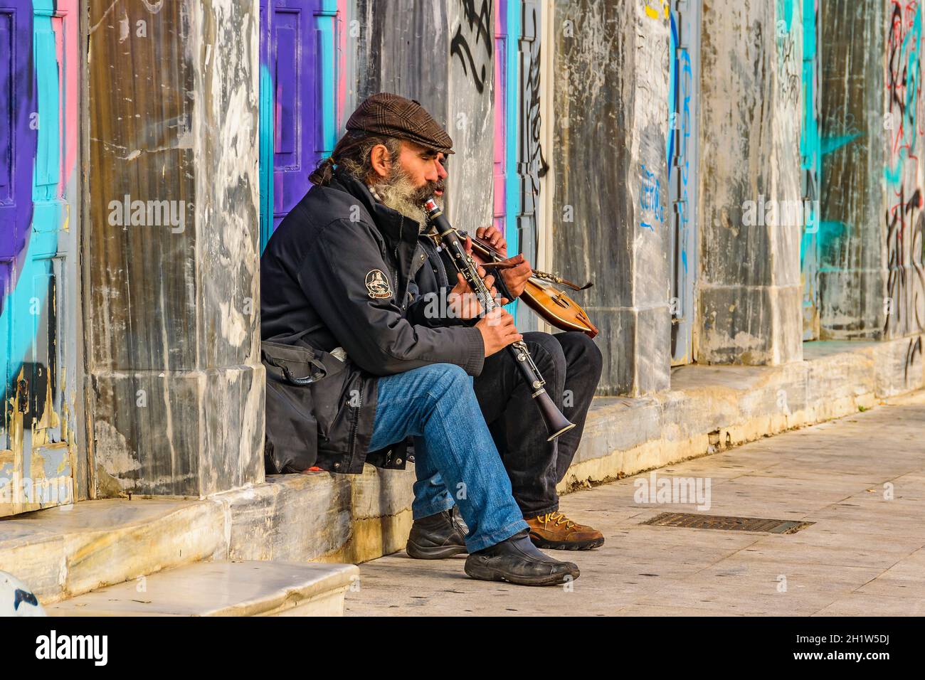 ATHENS, GREECE, DECEMBER - 2019 - Two adult men playing traditional ...