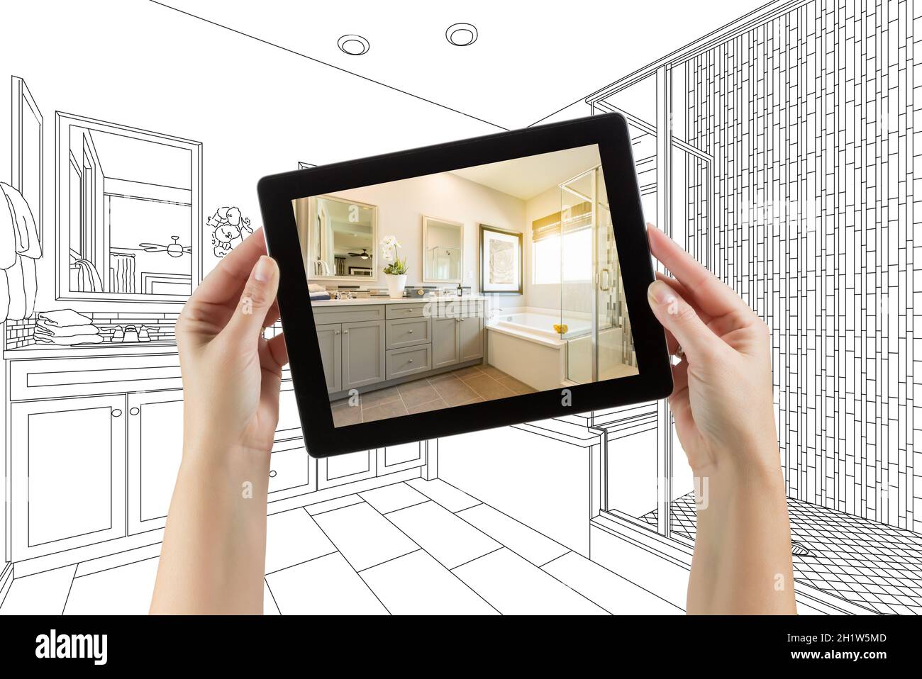 Hands Holding Computer Tablet with Master Bathroom Photo on Screen and ...