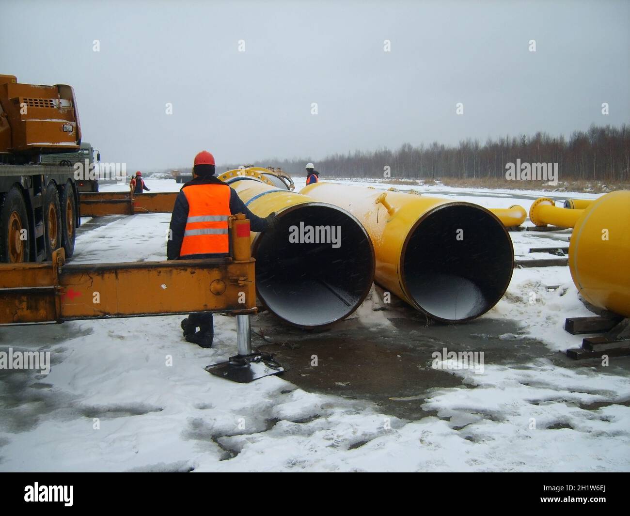 Construction of the gas pipeline on the ground. Transportation of ...