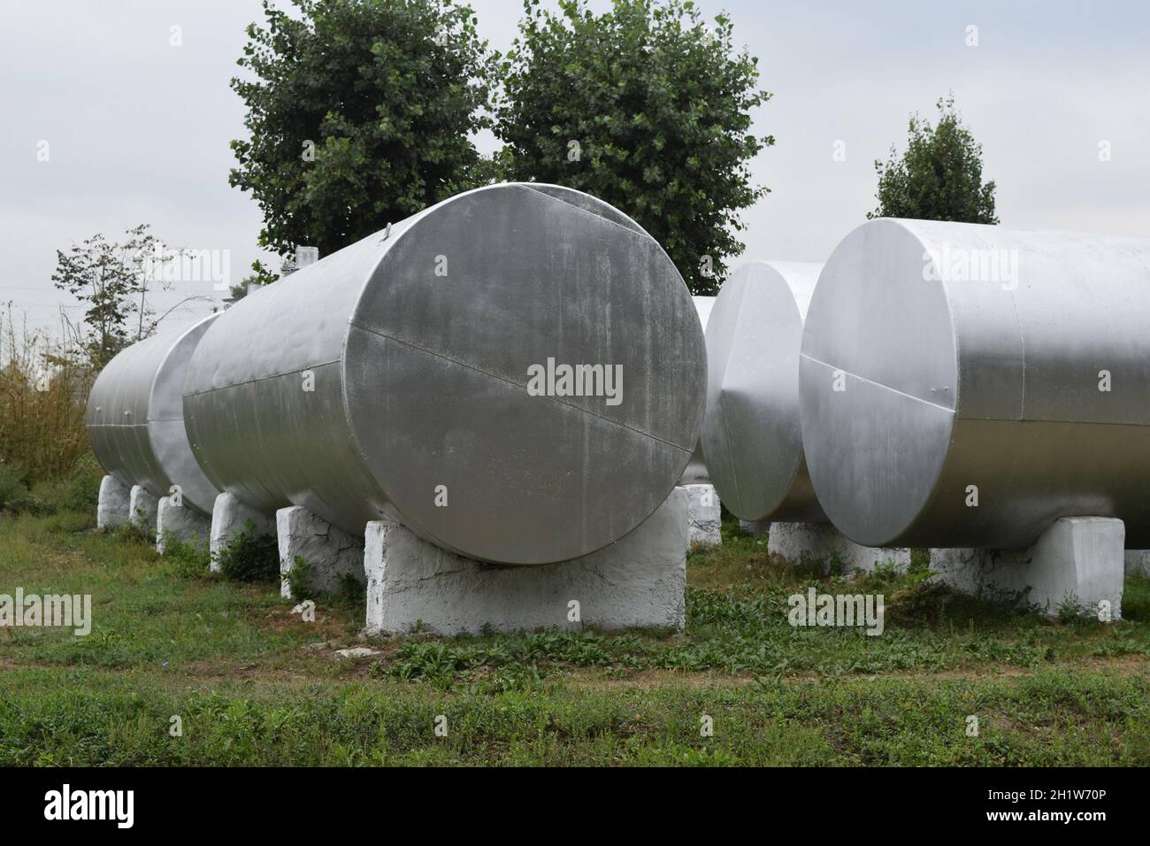 Silver tanks for storage of fertilizers. Agricultural buildings Stock ...