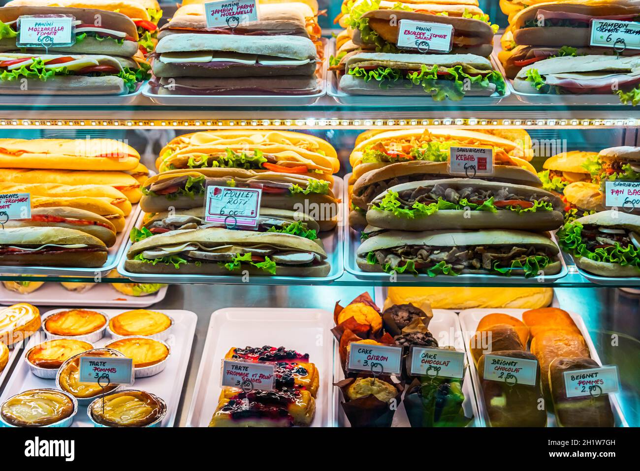 MONACO, MONACO - SEP 6, 2018: Freshly prepared sandwiches and cakes put ...