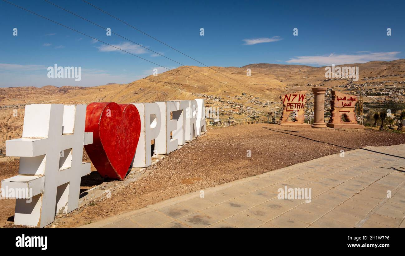 Hashtag road sign in Petra displaying "I Love Petra" when entering the ...
