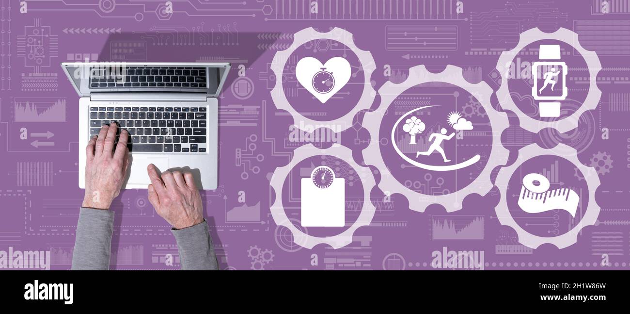 Top view of hands using laptop with symbol of jogging concept Stock ...