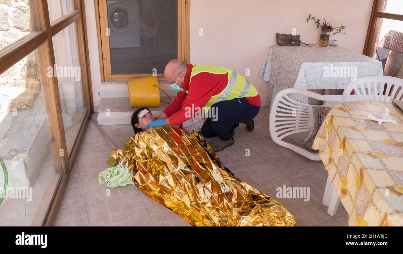 paramedic intervened in first aid, prepared with first aid kit, such as ...